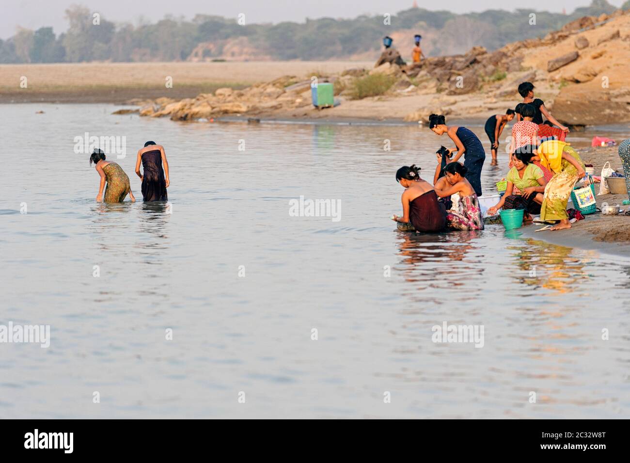 Women bathing in river hi-res stock photography and images - Alamy