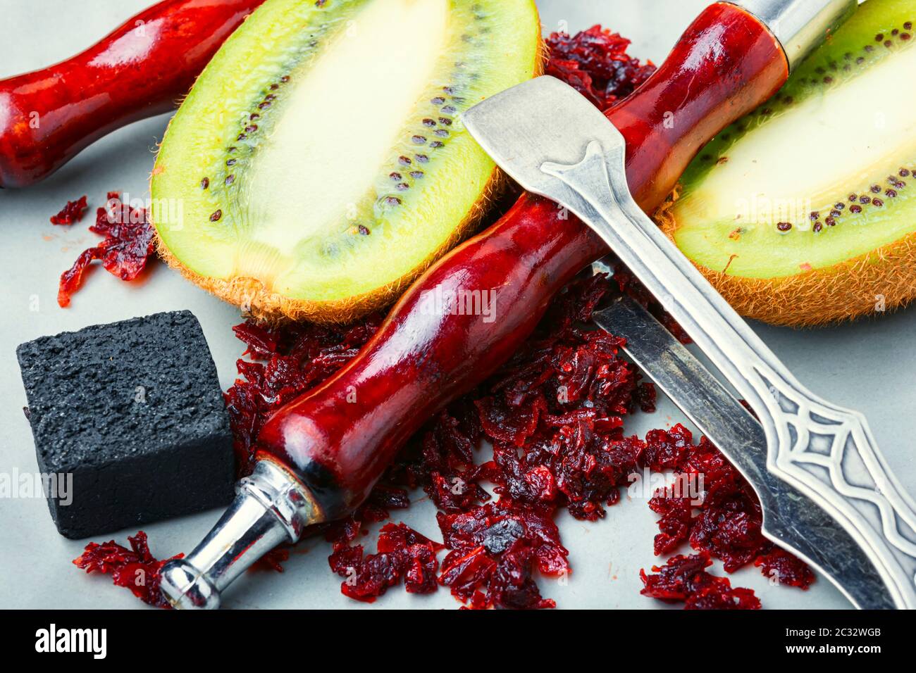 Arabic smoking hookah with taste of kiwi.Fruit shisha tobacco. Tobacco ...