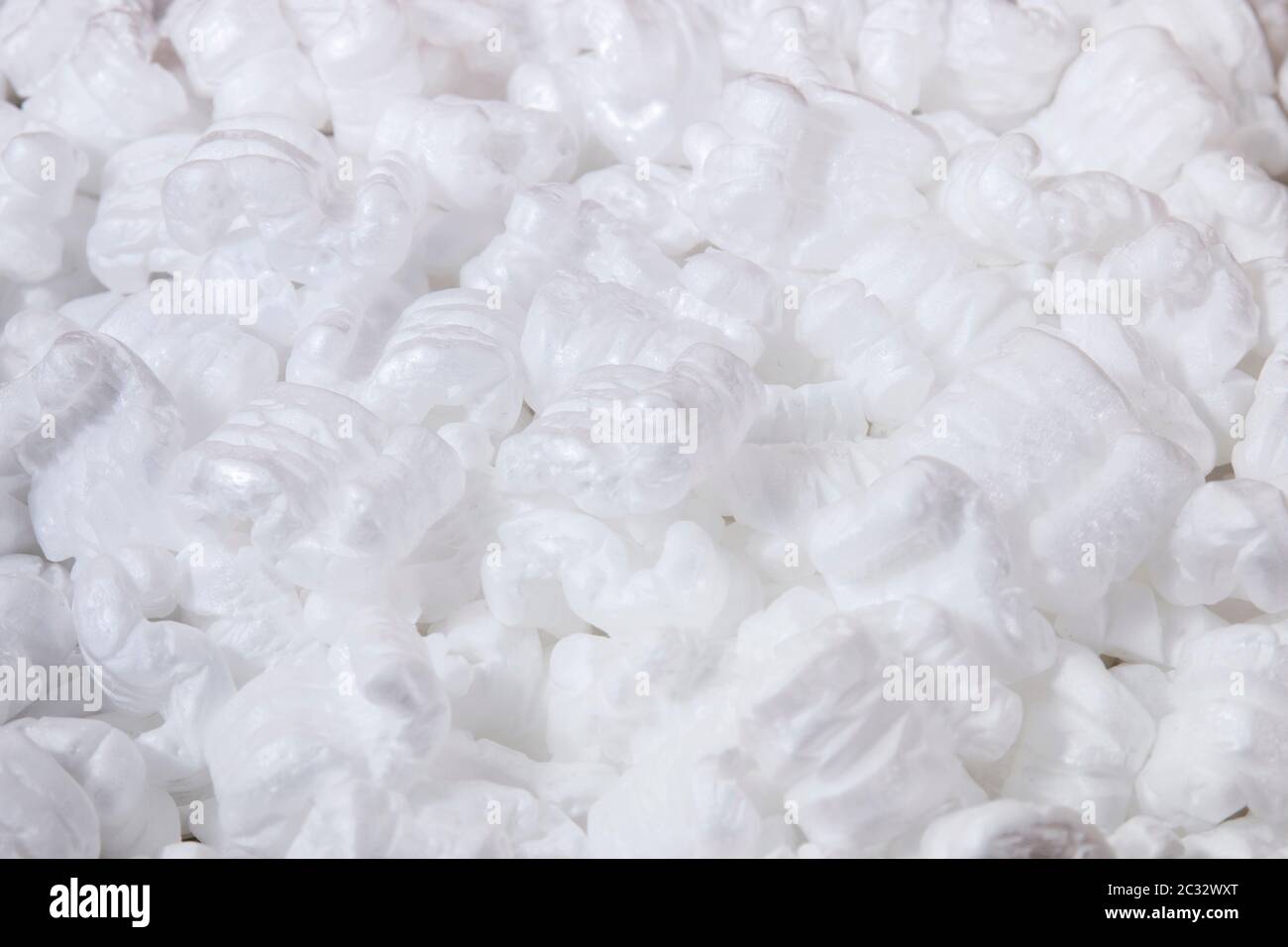 Polystyrene or white styrofoam packing pieces used for minimize bumps ...