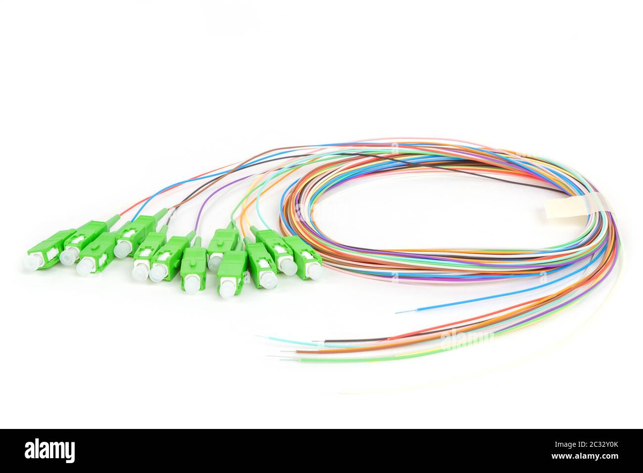 green fiber optic SC connectors fan out isolated on white background ...