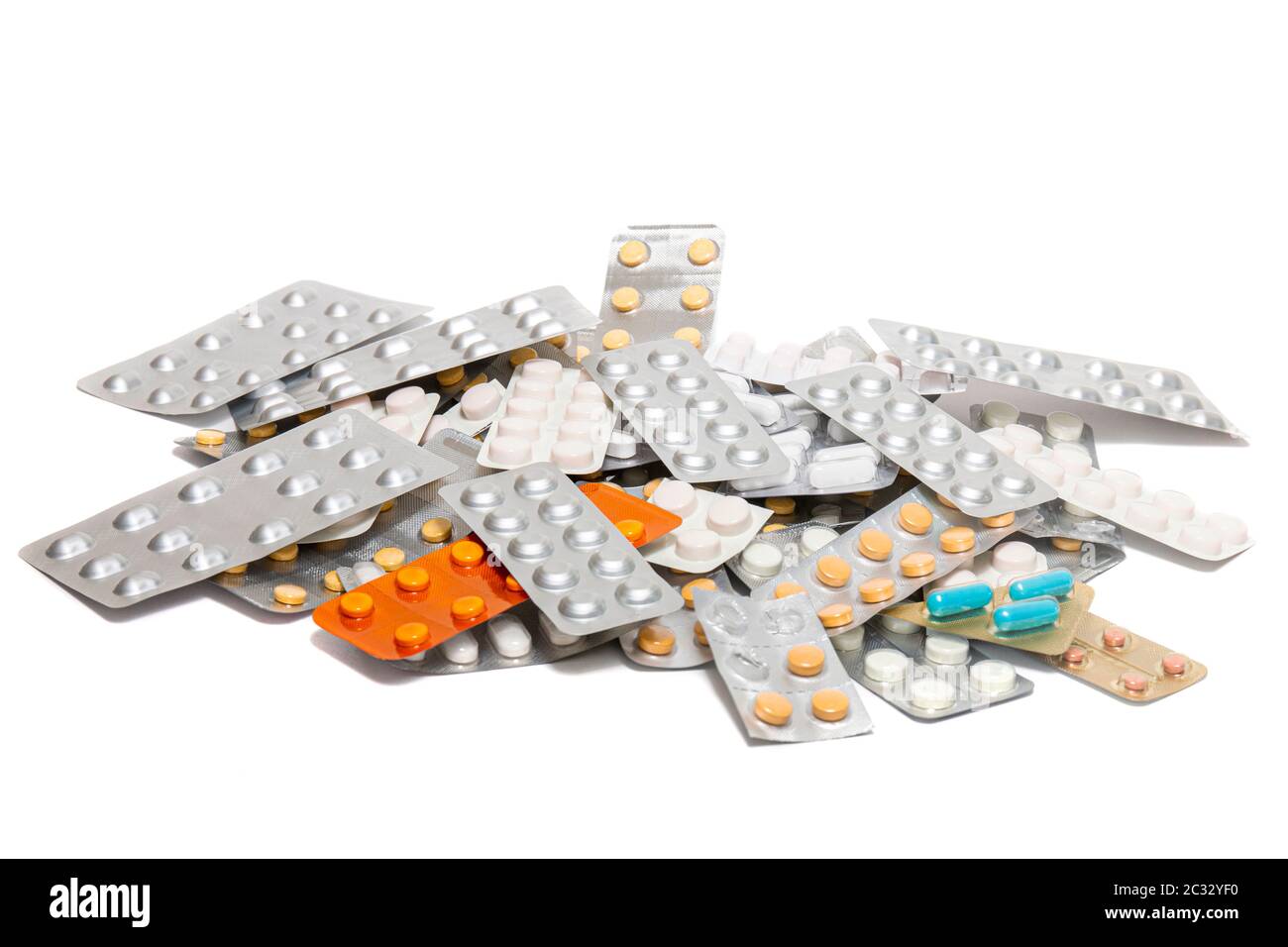 Assorted mix of pills over a white background Stock Photo - Alamy