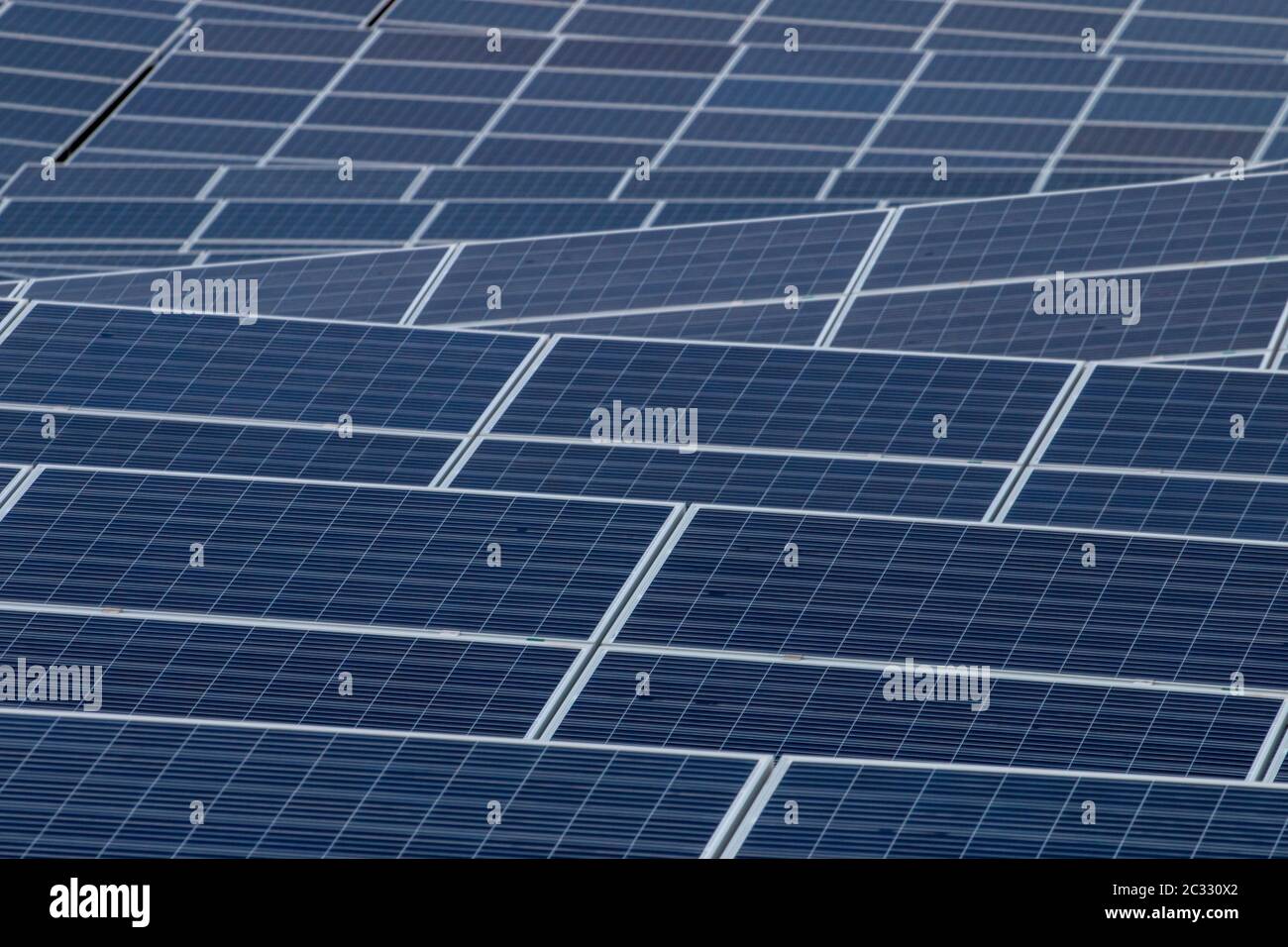 View of a field of modern ecologic solar panels Stock Photo - Alamy