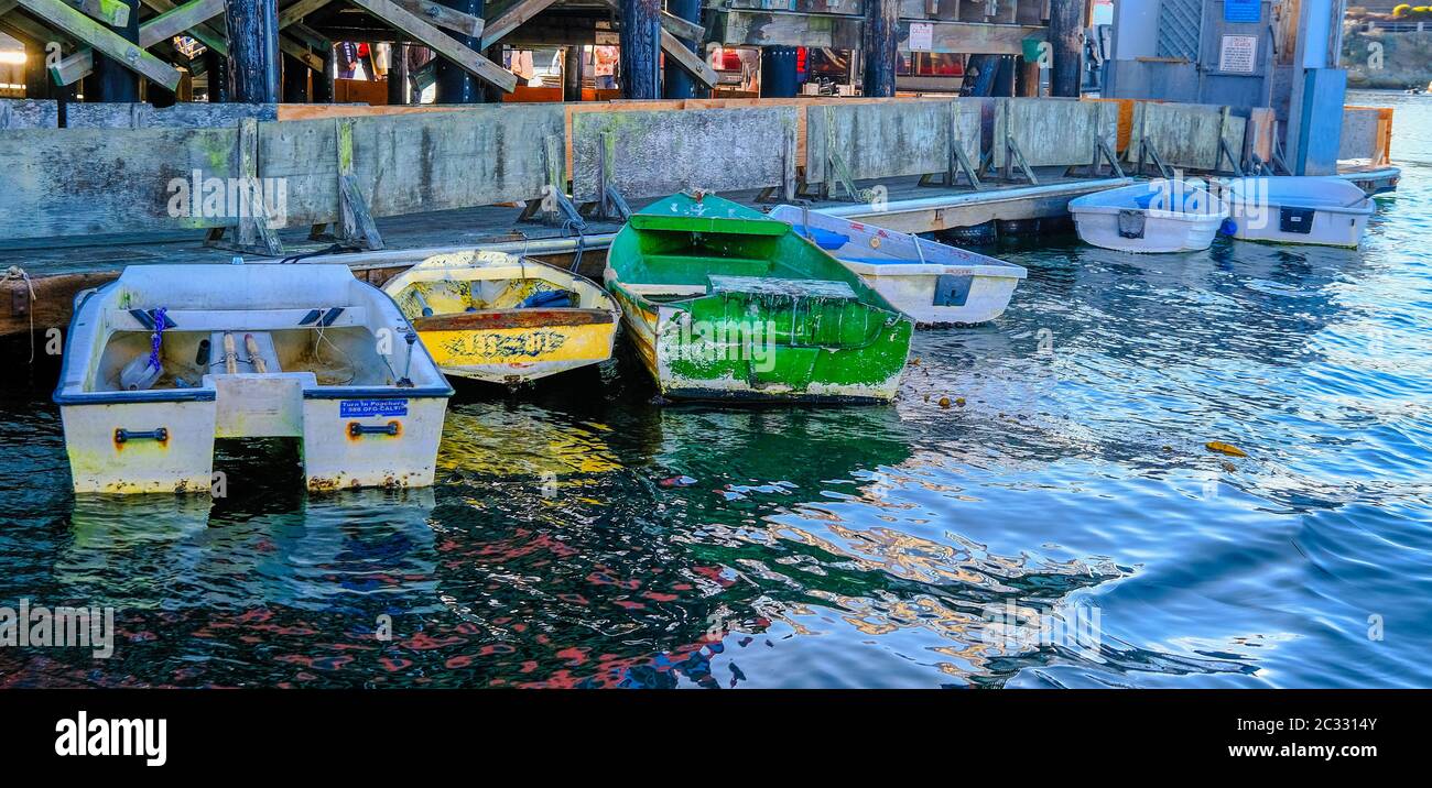 Old Boats Under Dock Stock Photo - Alamy