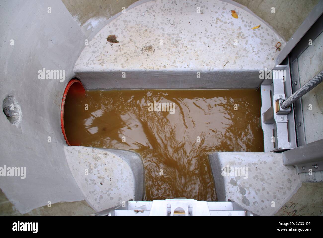 View from above into a sewer manhole Stock Photo - Alamy
