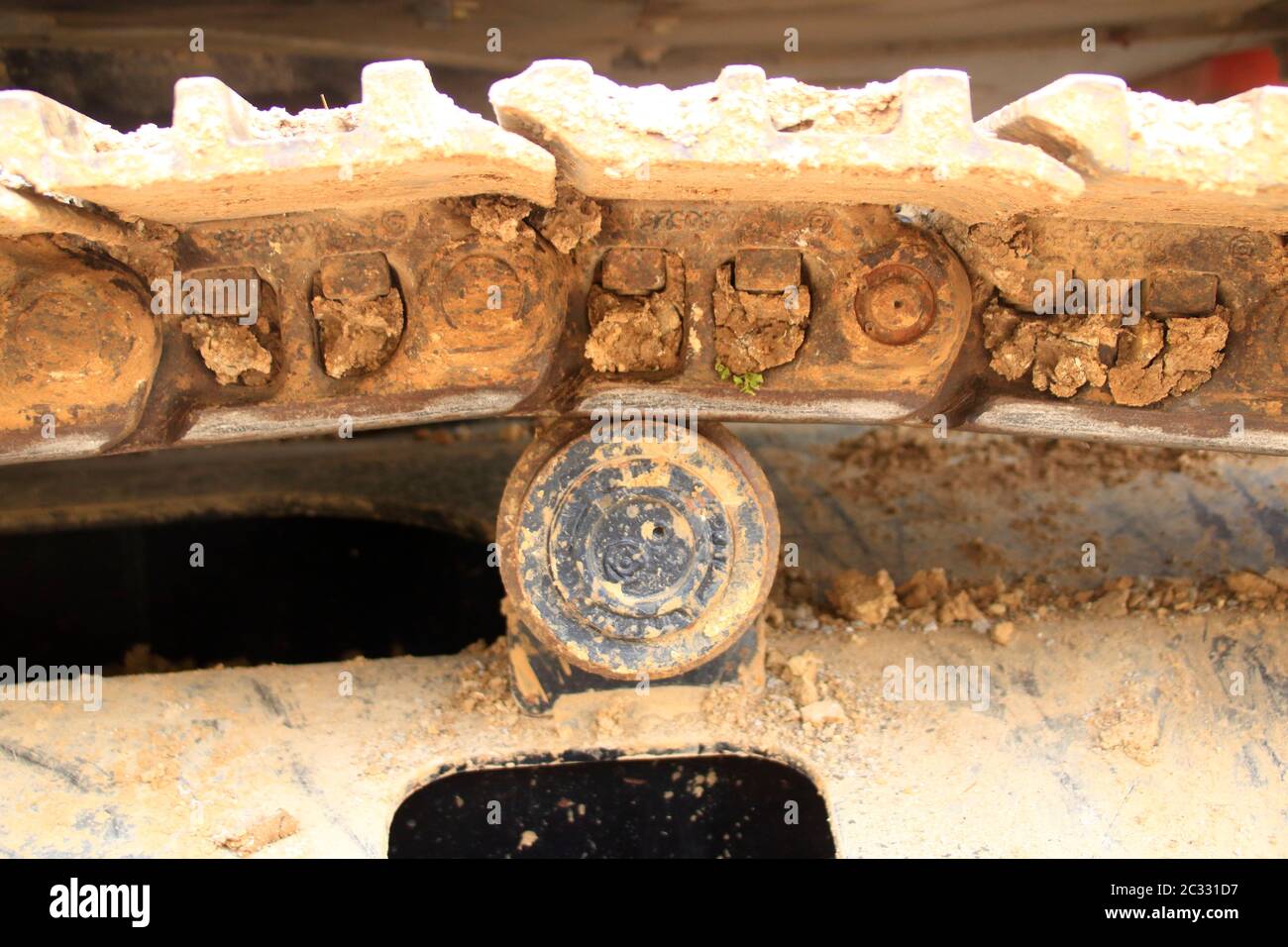 Drive chain of a construction machine Stock Photo - Alamy