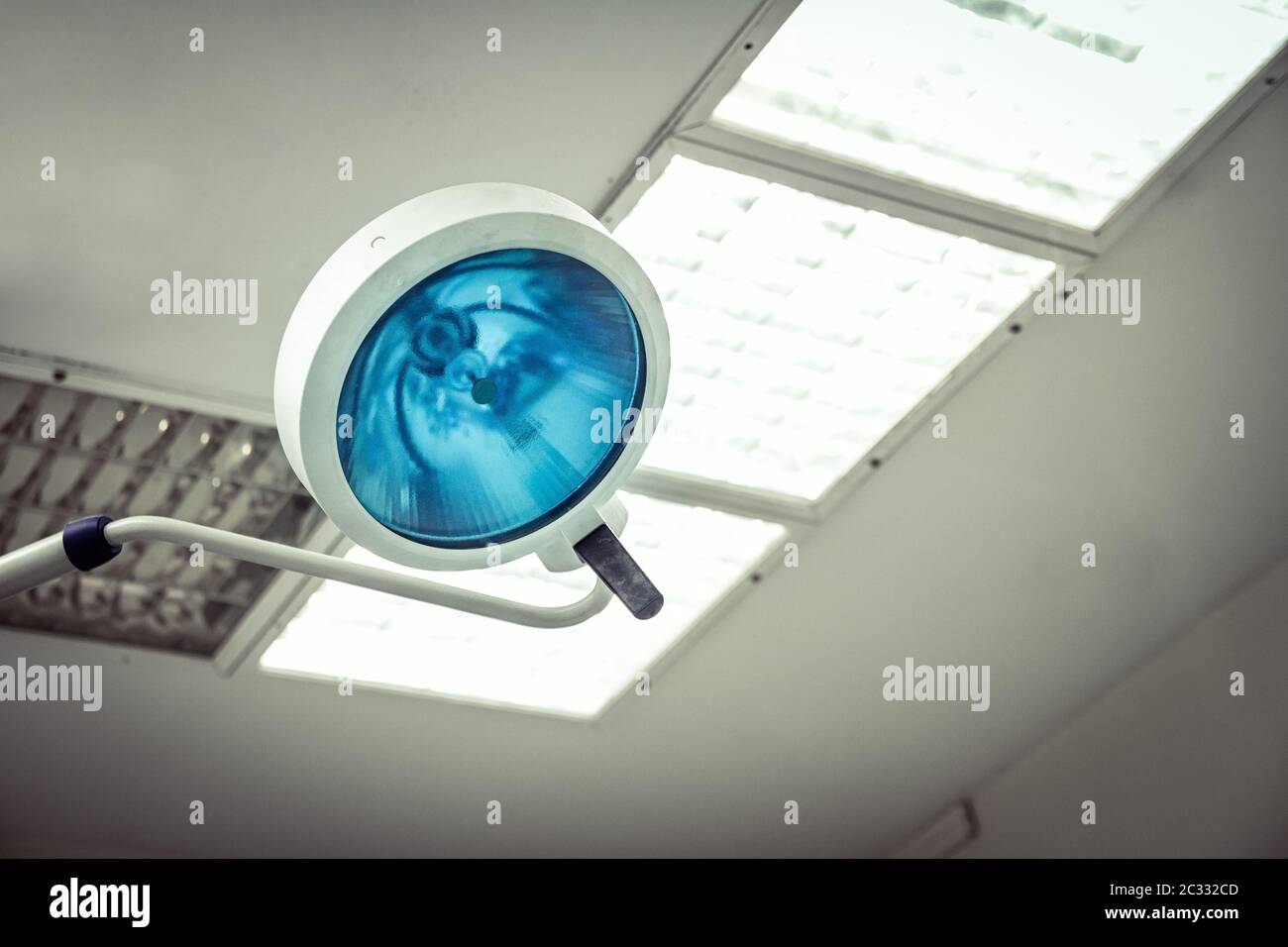 Lamp inside operating room in a hospital. Close up view with copy space ...