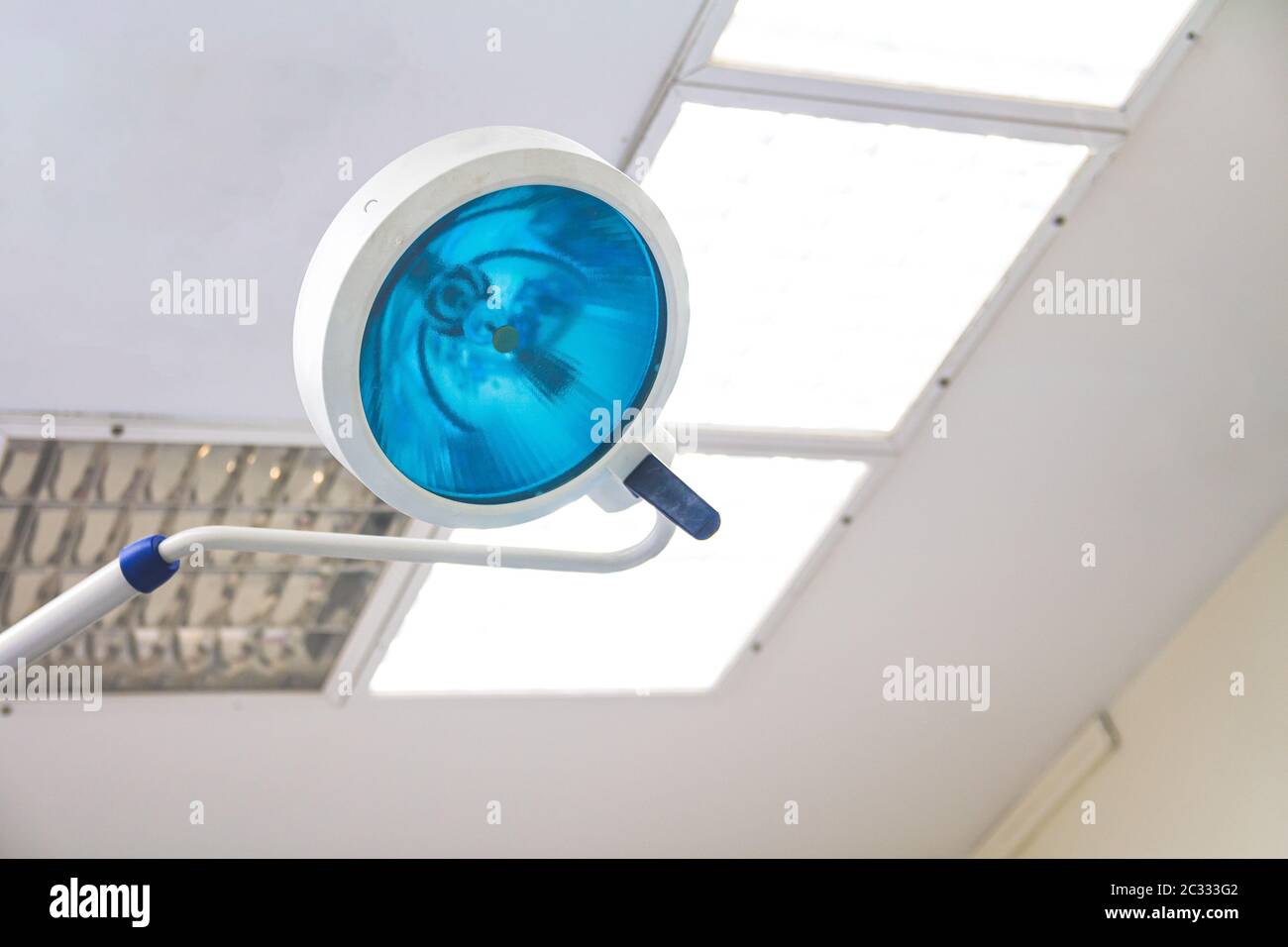 Lamp inside operating room in a hospital. Close up view with copy space ...