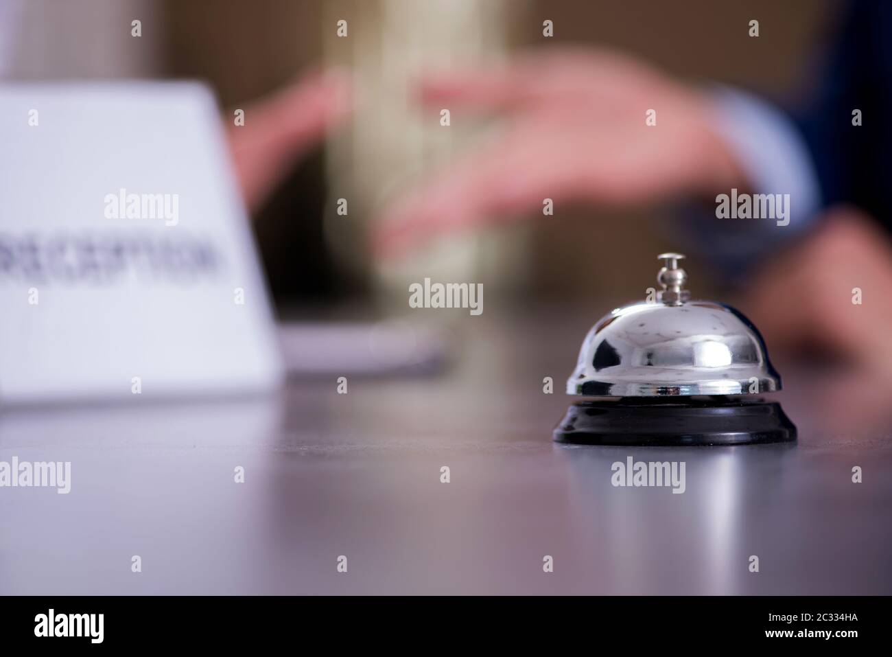 Hotel manager reception desk bell hi-res stock photography and images ...