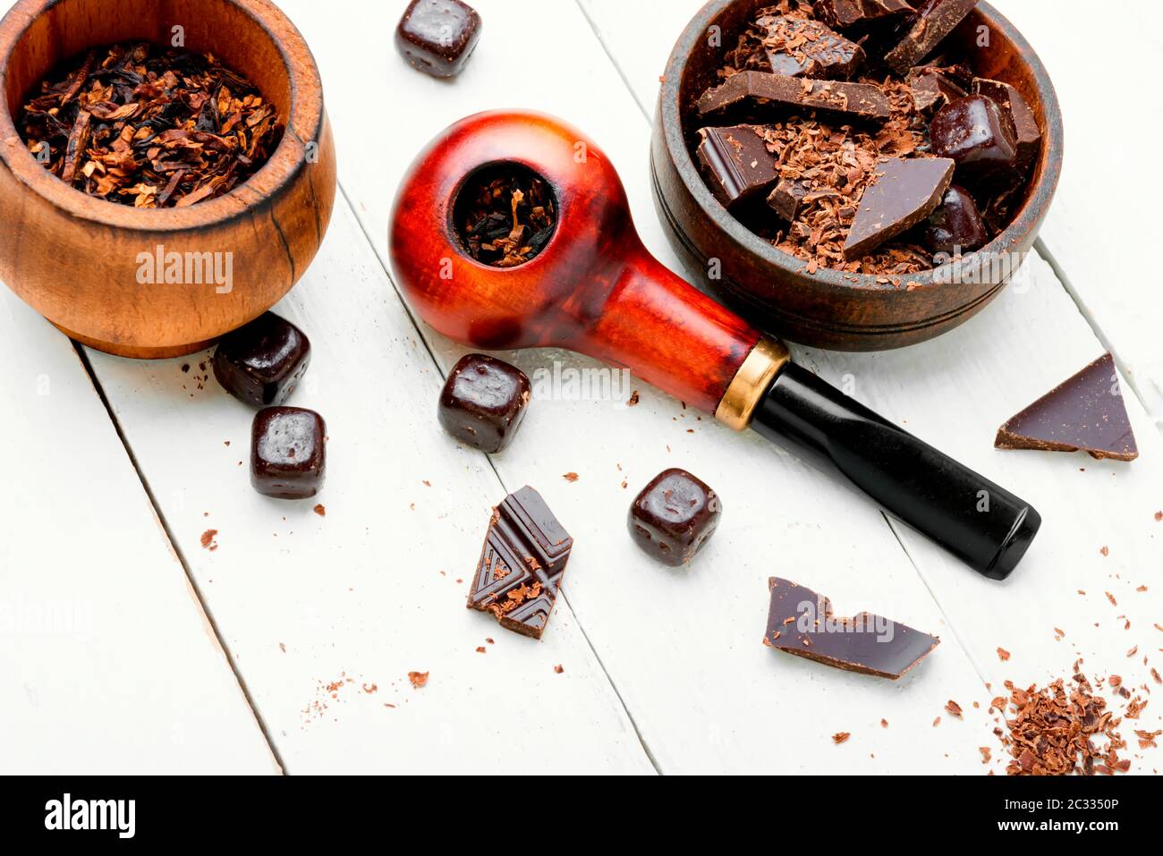 Chocolate flavored tobacco for smoking pipes.Tobacco pipe filled with ...