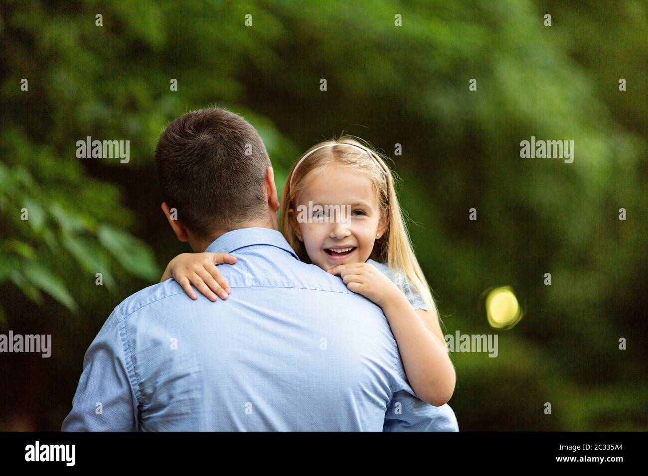 Happy father's day. Dad and his child daughter are playing and having ...