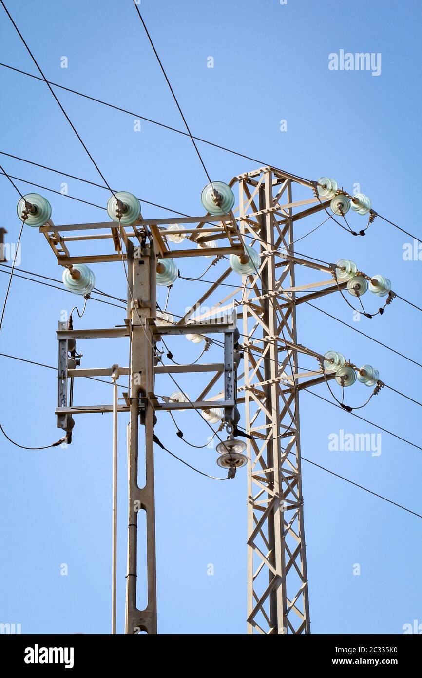 A mast, power pole at which the lines change direction Stock Photo - Alamy