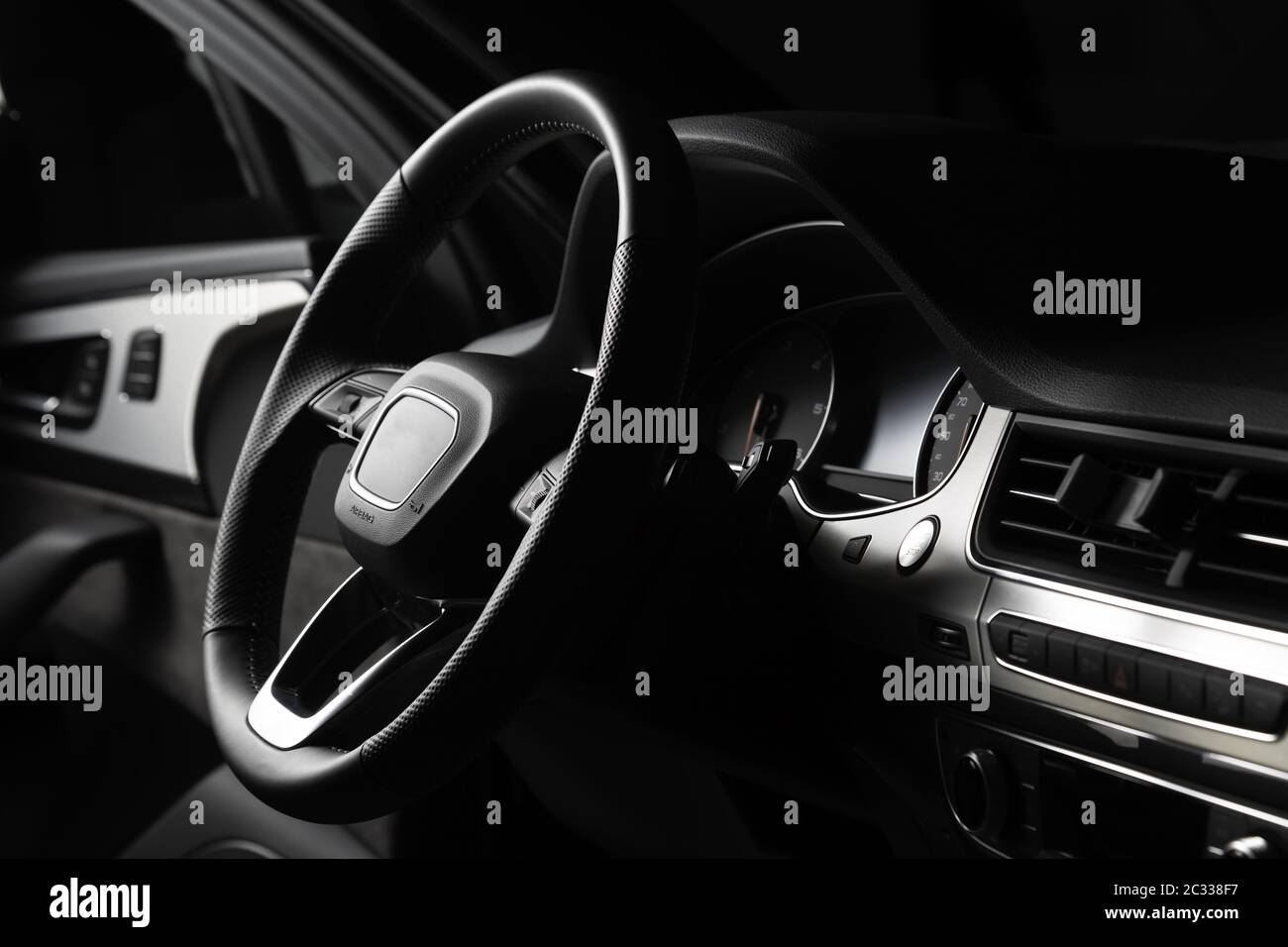 Interior of luxury suv car with black leather steering wheel and shift ...