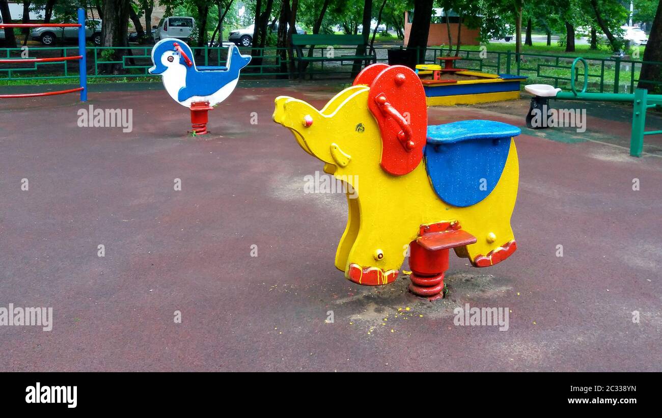 Playground equipment swing rocking horse hi-res stock photography and ...