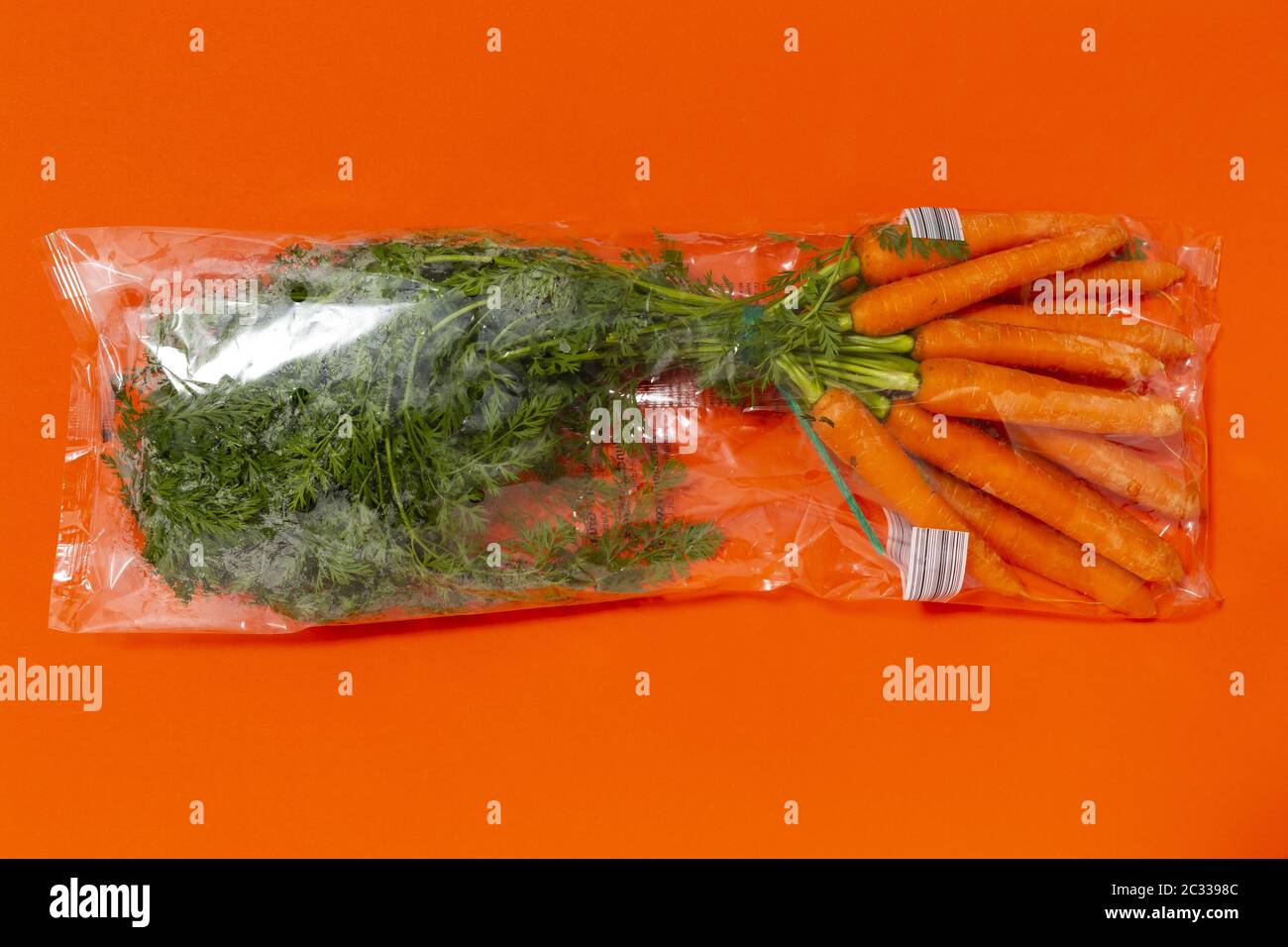 Some carrots in plastic packaging Stock Photo - Alamy