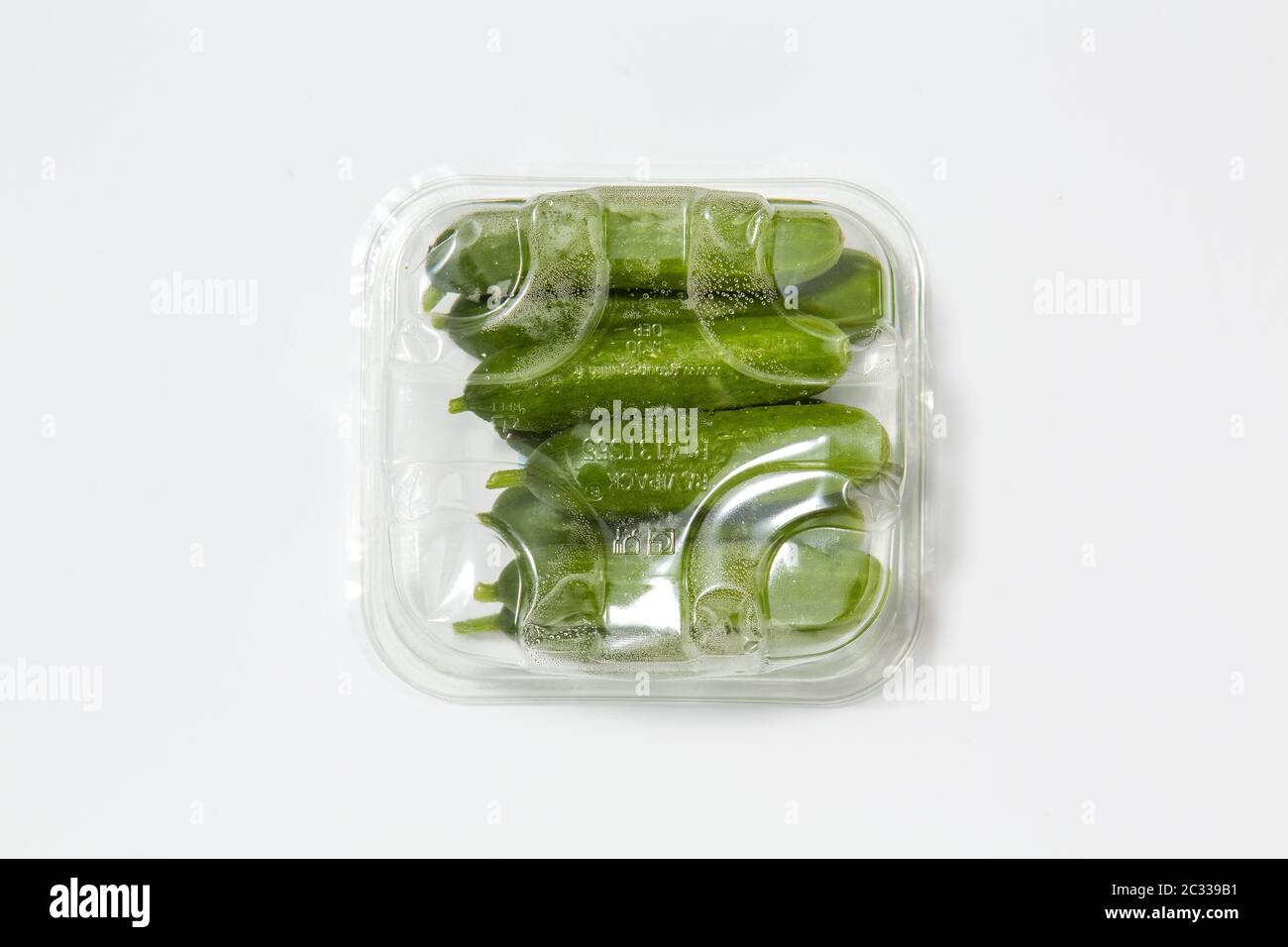 Some cucumber in plastic packaging Stock Photo - Alamy