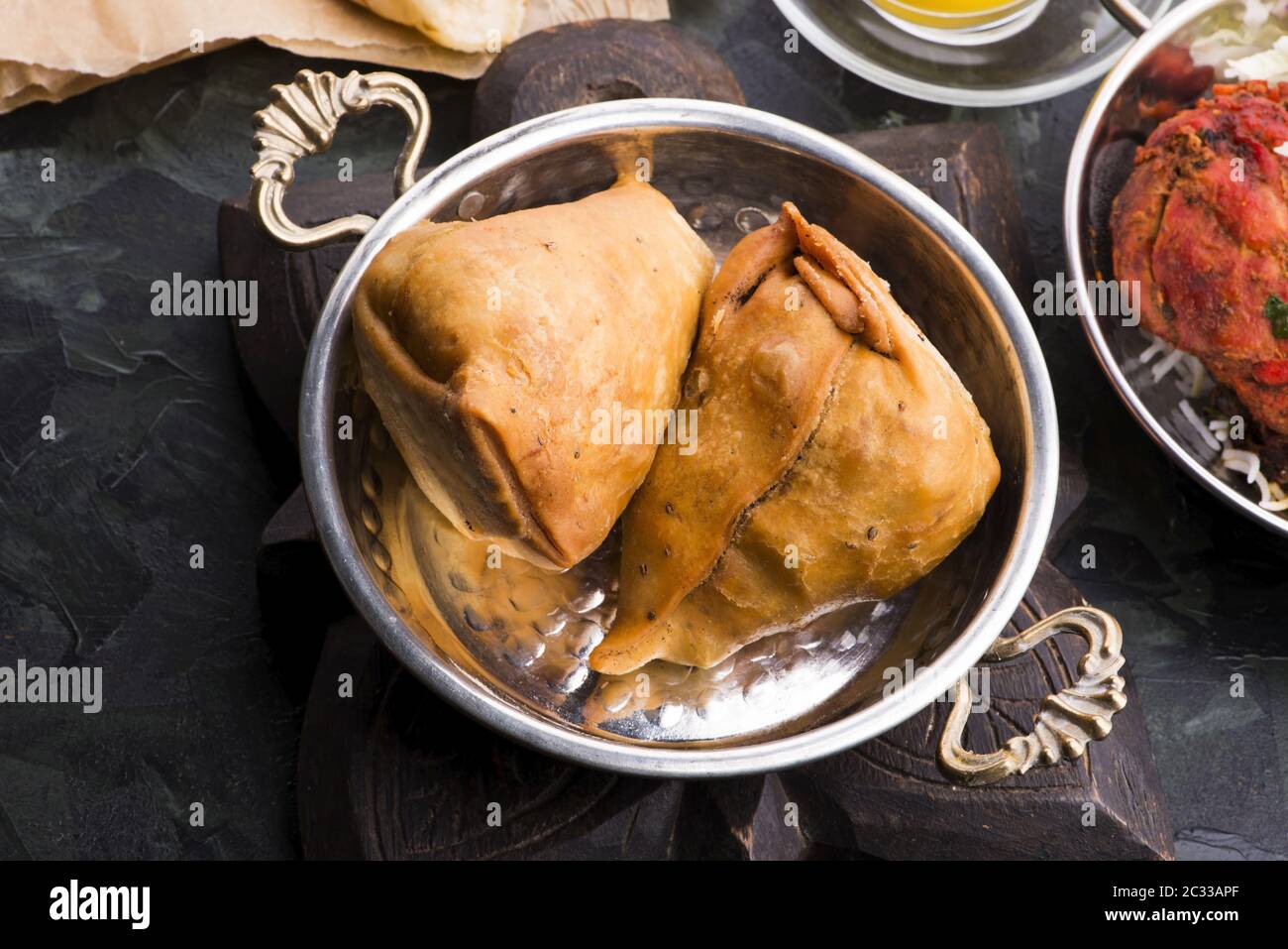 Veg Samosa - is a crispy and spicy Indian triangle shape snack Stock ...