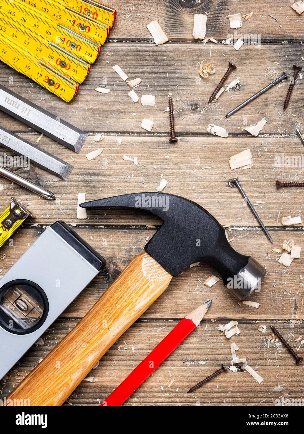 Top view of carpenter's tools on an antique wooden table. Construction ...