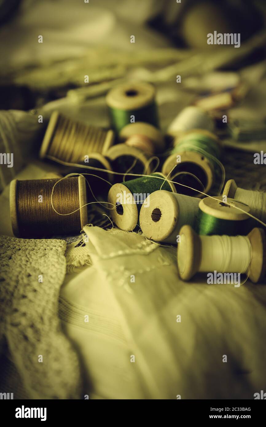 Old sewing threads, objects for sewing clothes Stock Photo - Alamy