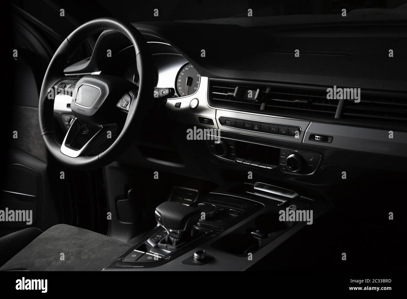 Interior of luxury suv car with black leather steering wheel and shift ...
