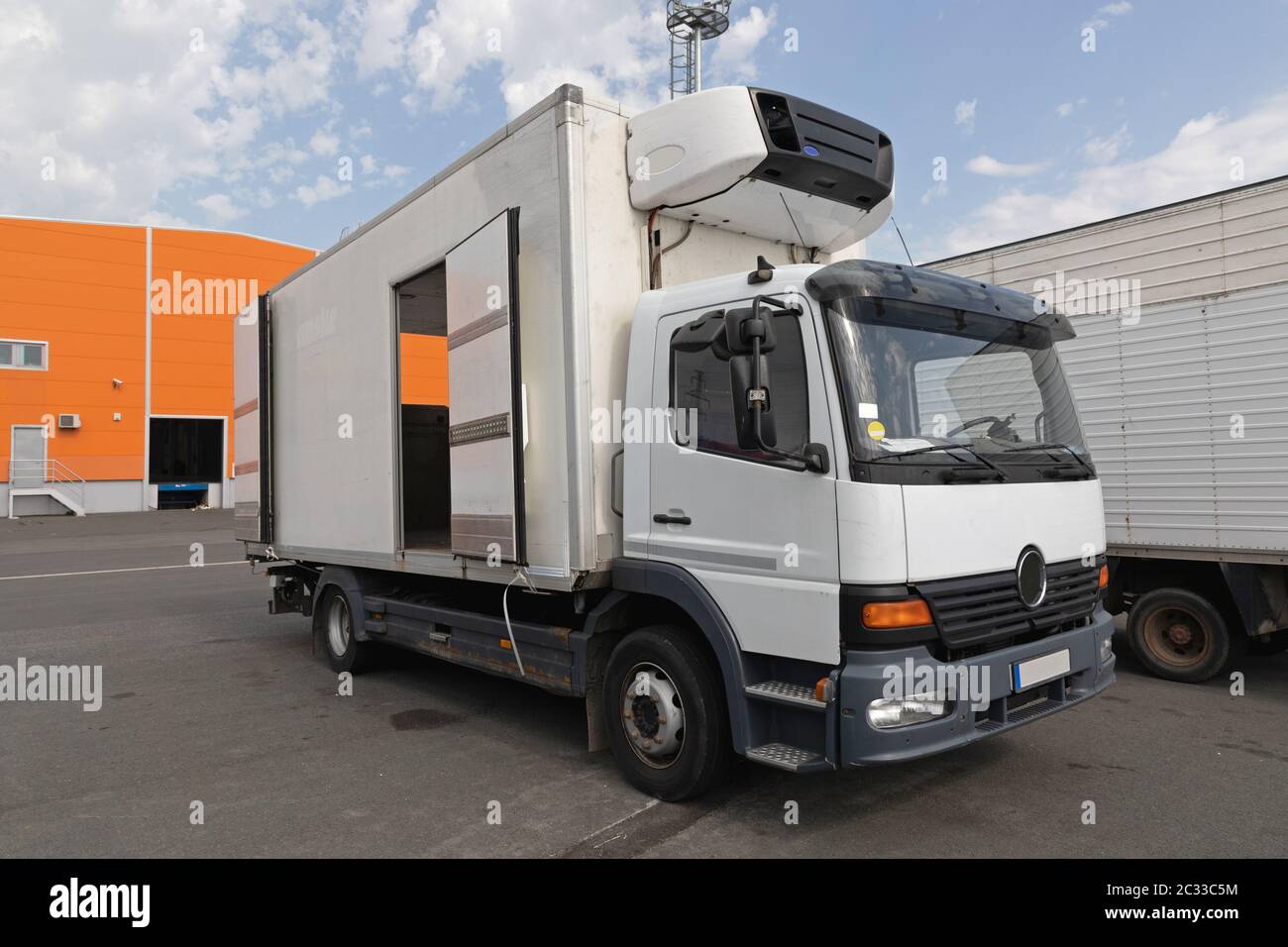Refrigerated Cargo Transport Truck With Cooling Unit Stock Photo - Alamy