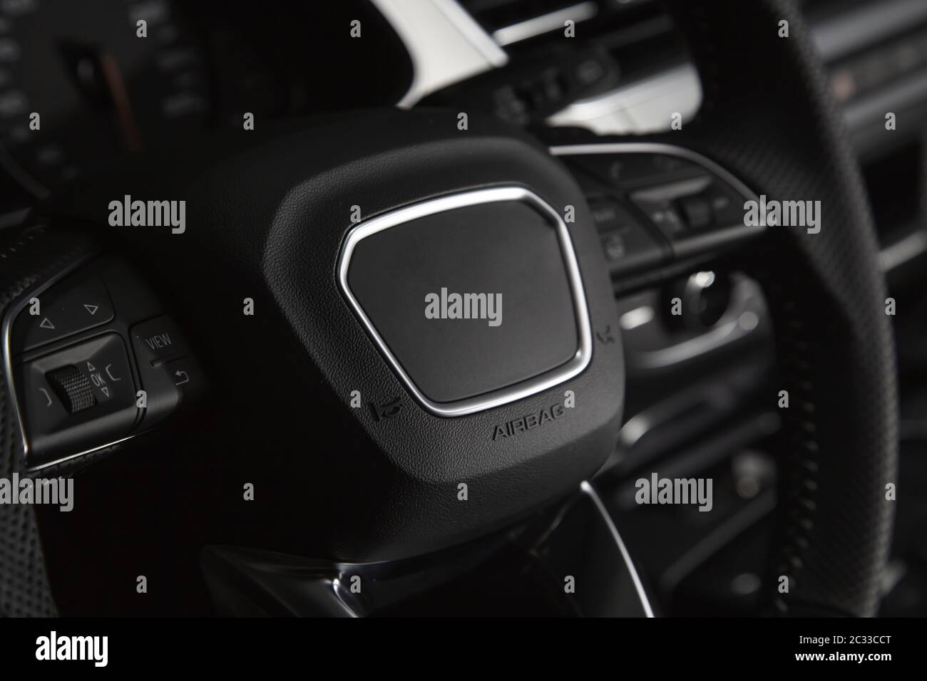 Multifunction steering wheel with buttons and airbag..Black steering ...