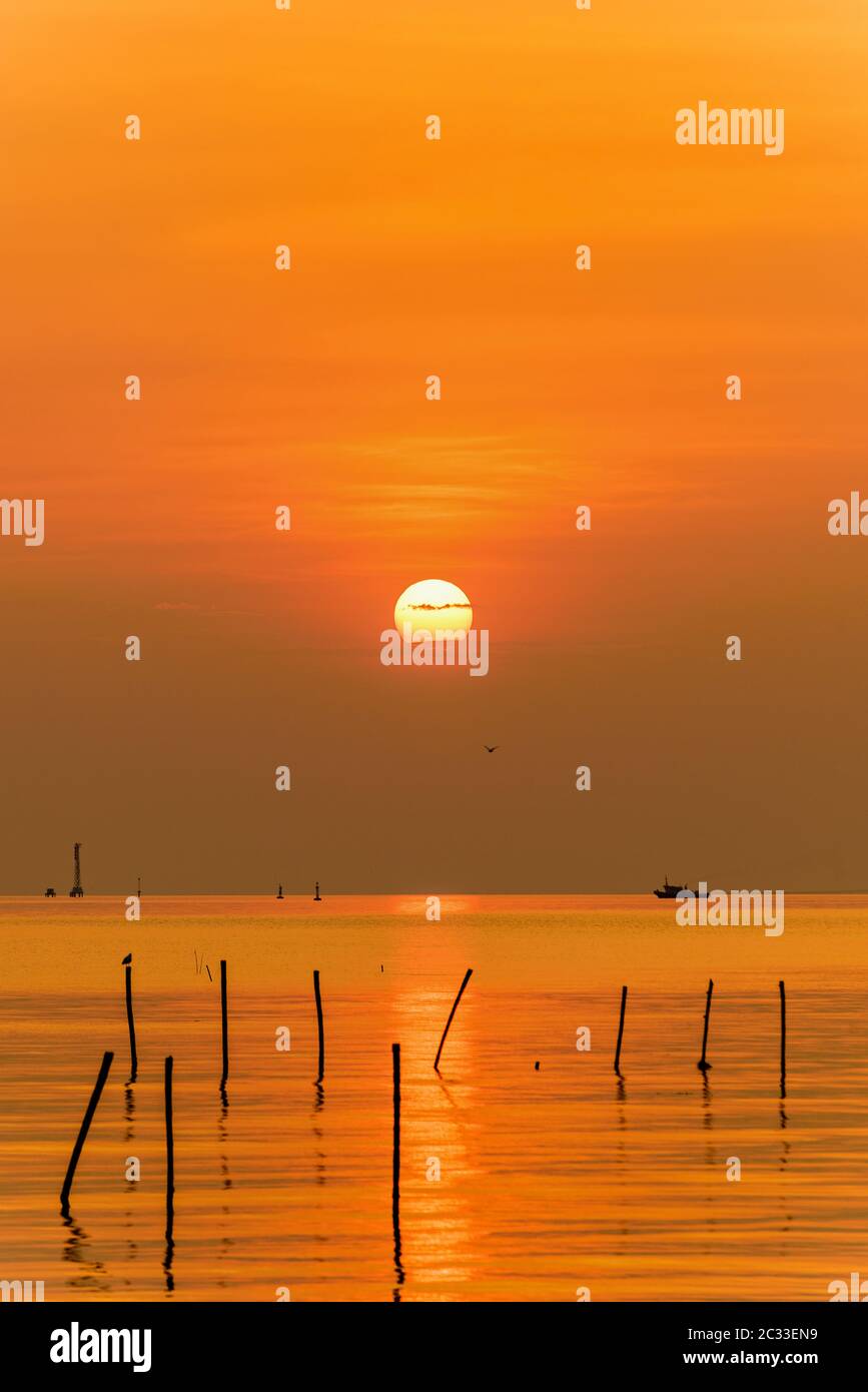 Beautiful nature landscape bright yellow sun reflecting orange light on ...
