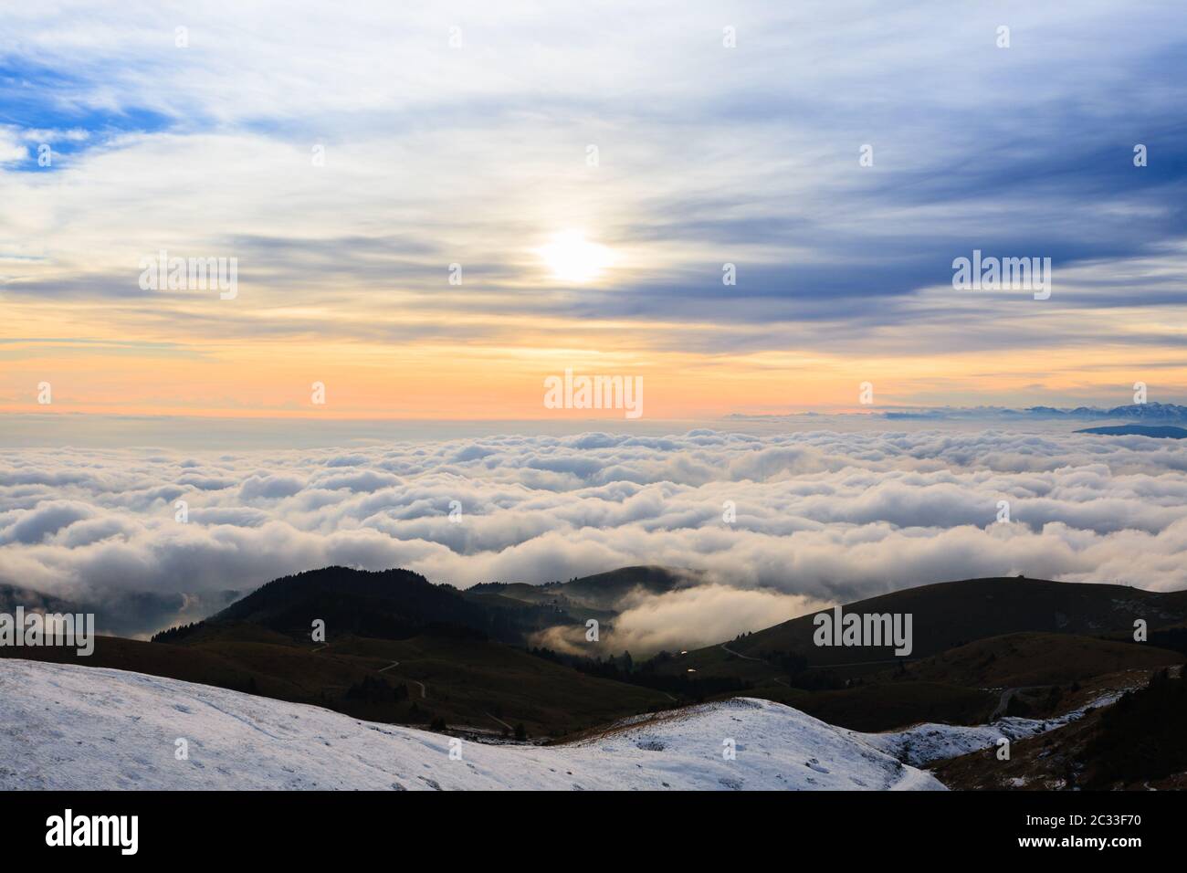 Mount Grappa landscape, Italian alps, Italy. Sunset on clouds Stock ...