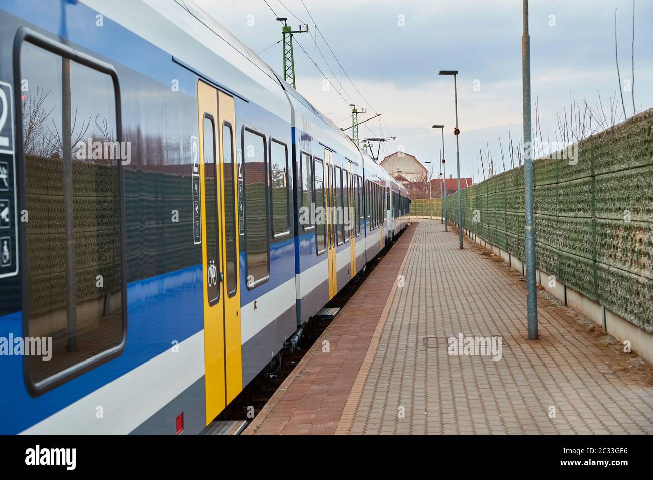 Modern train at a station Stock Photo - Alamy
