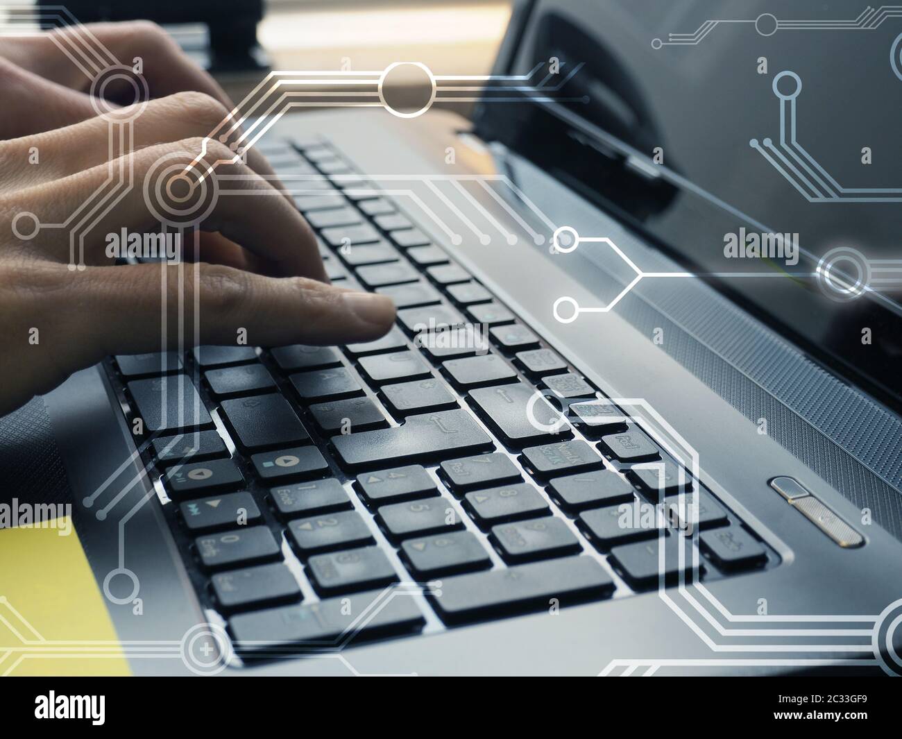 Hands on a laptop Stock Photo - Alamy