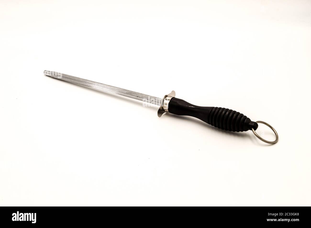 Sharpening steel with black handle on a white background Stock Photo ...