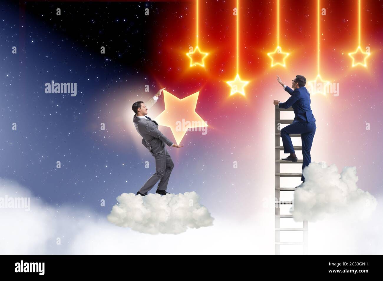 Businessman reaching out for stars Stock Photo - Alamy