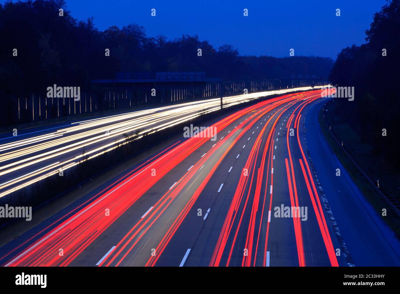 Night time traffic on highway Stock Photo - Alamy