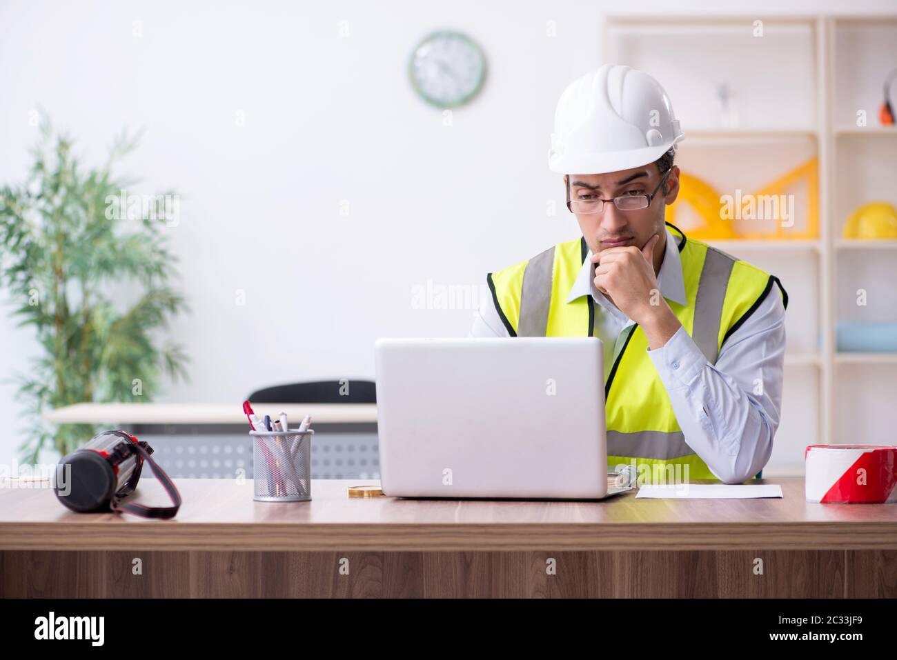 Focused architect working computer in hi-res stock photography and ...