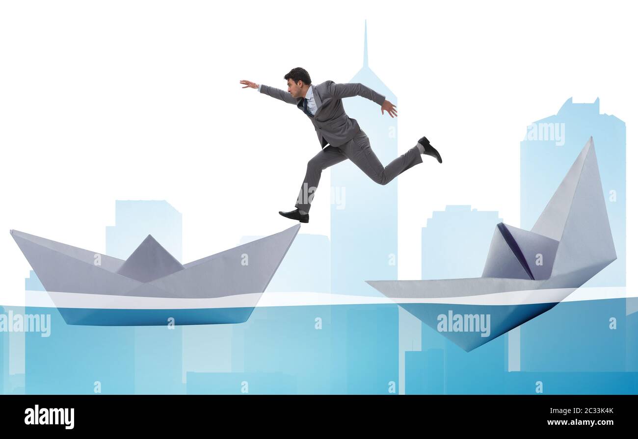 Businessman escaping sunken paper boat ship Stock Photo - Alamy