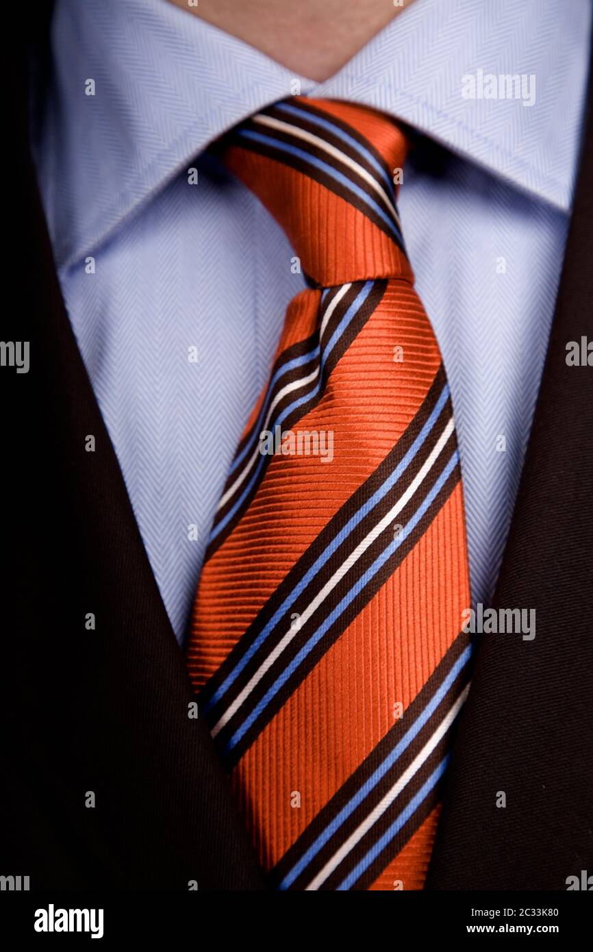 detail of a Business man Suit with red tie Stock Photo - Alamy