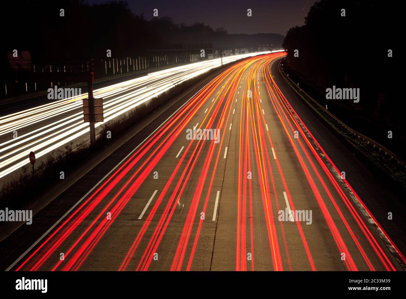 Night time traffic on highway Stock Photo - Alamy