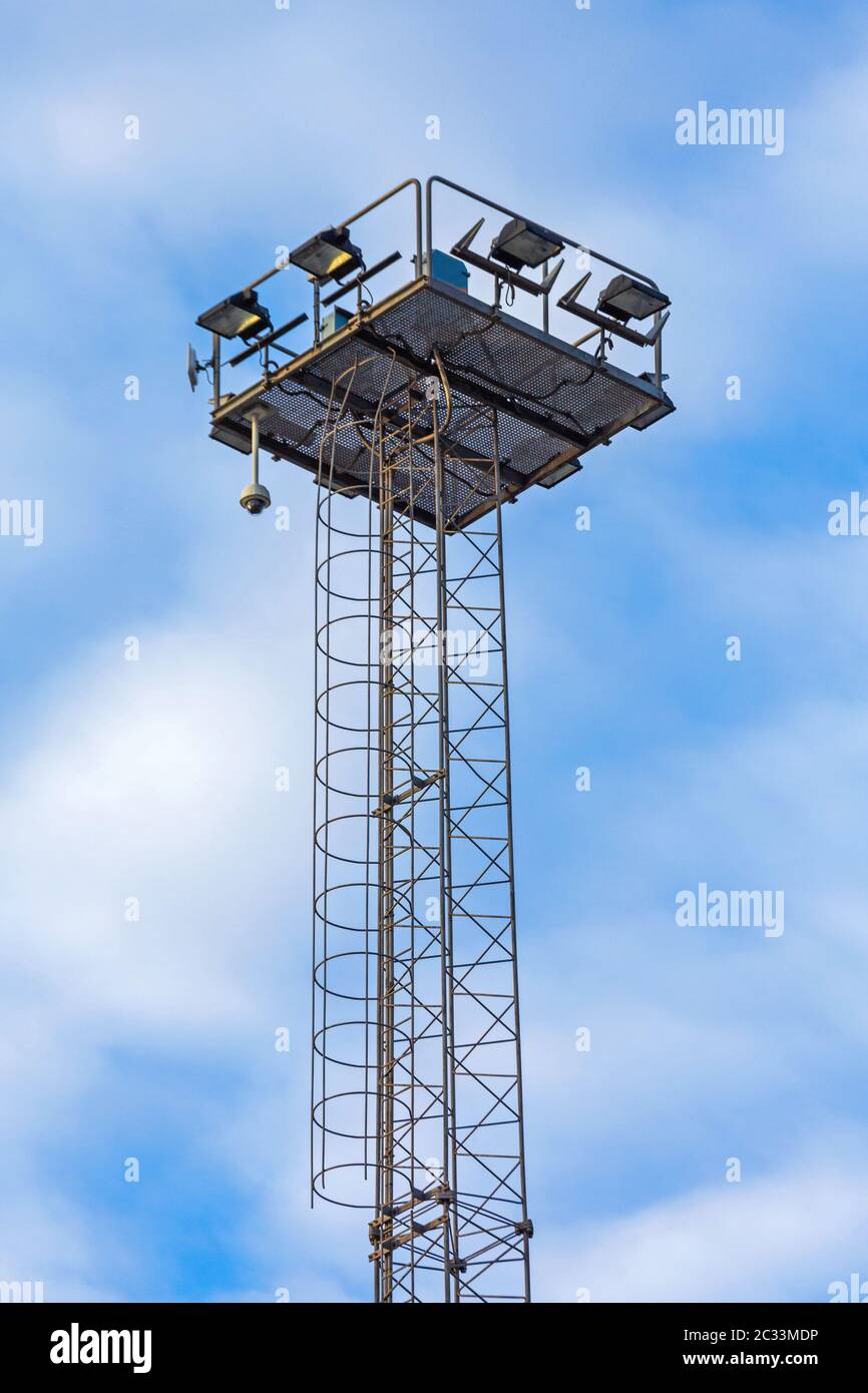 Tall tower with reflectors and cctv camera at construction site hi-res ...