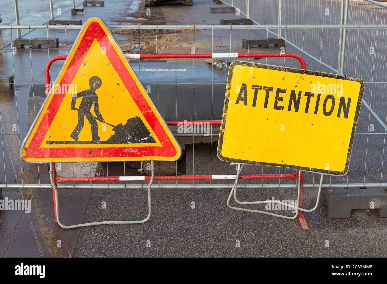 Road Works and Attention Sign at Construction Site Stock Photo - Alamy