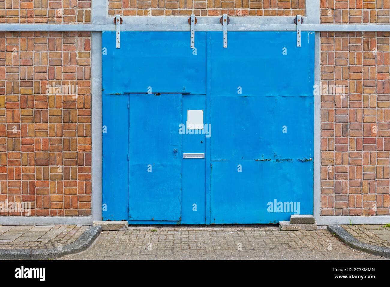 Big Blue Sliding Doors at Warehouse Building Stock Photo - Alamy