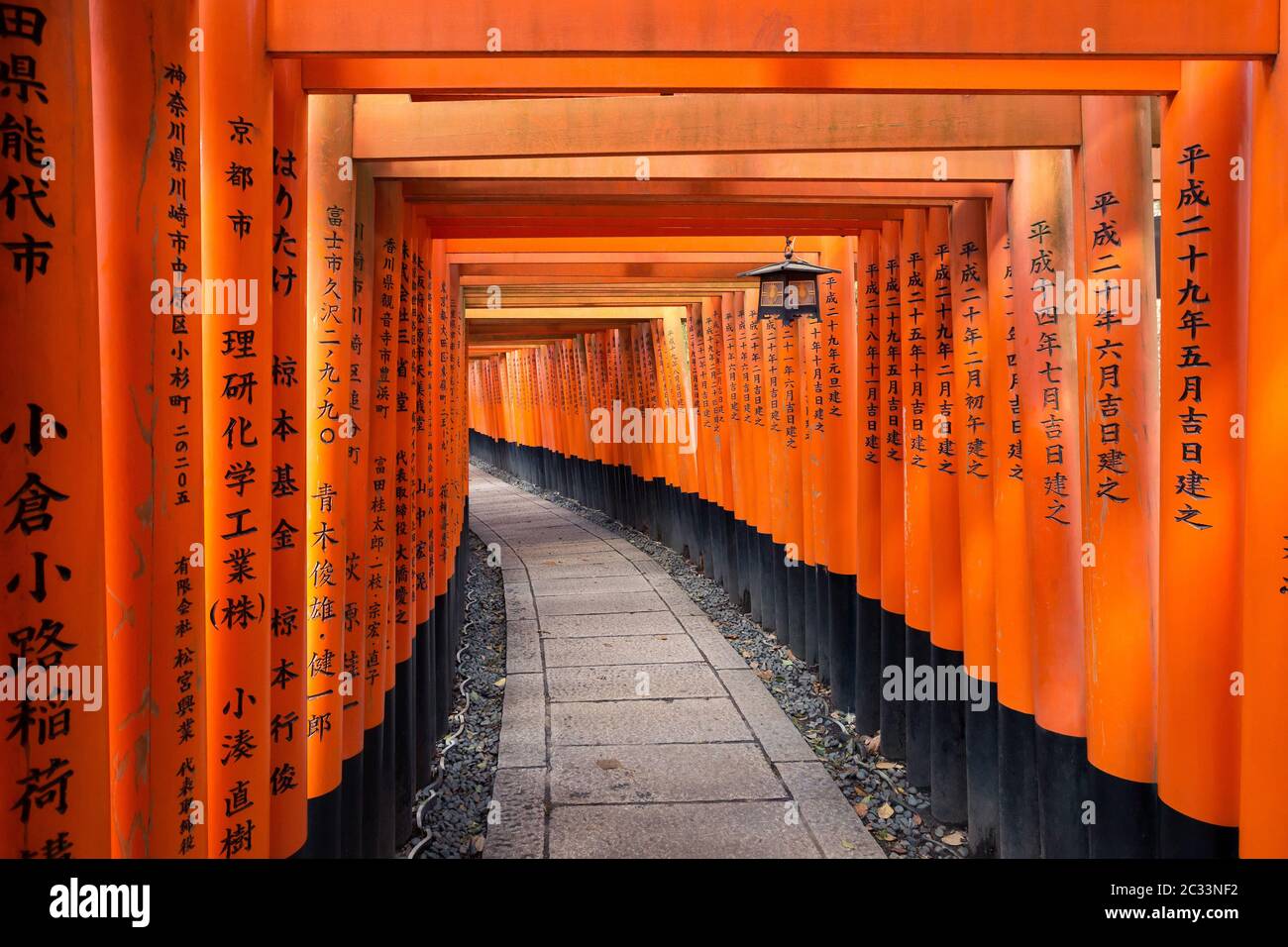 vermillion Torii path at Fushimi Inari Taisha Shrine in Kyoto, Japan ...