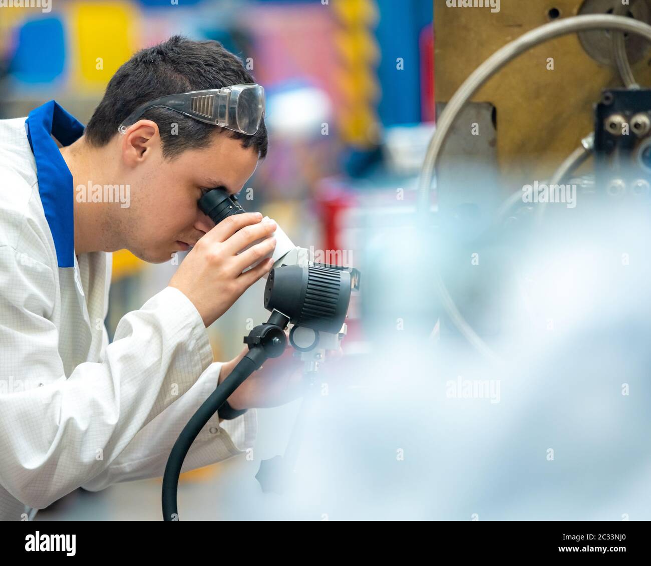 the engineer checks the correct setting of the metal mold for castings ...
