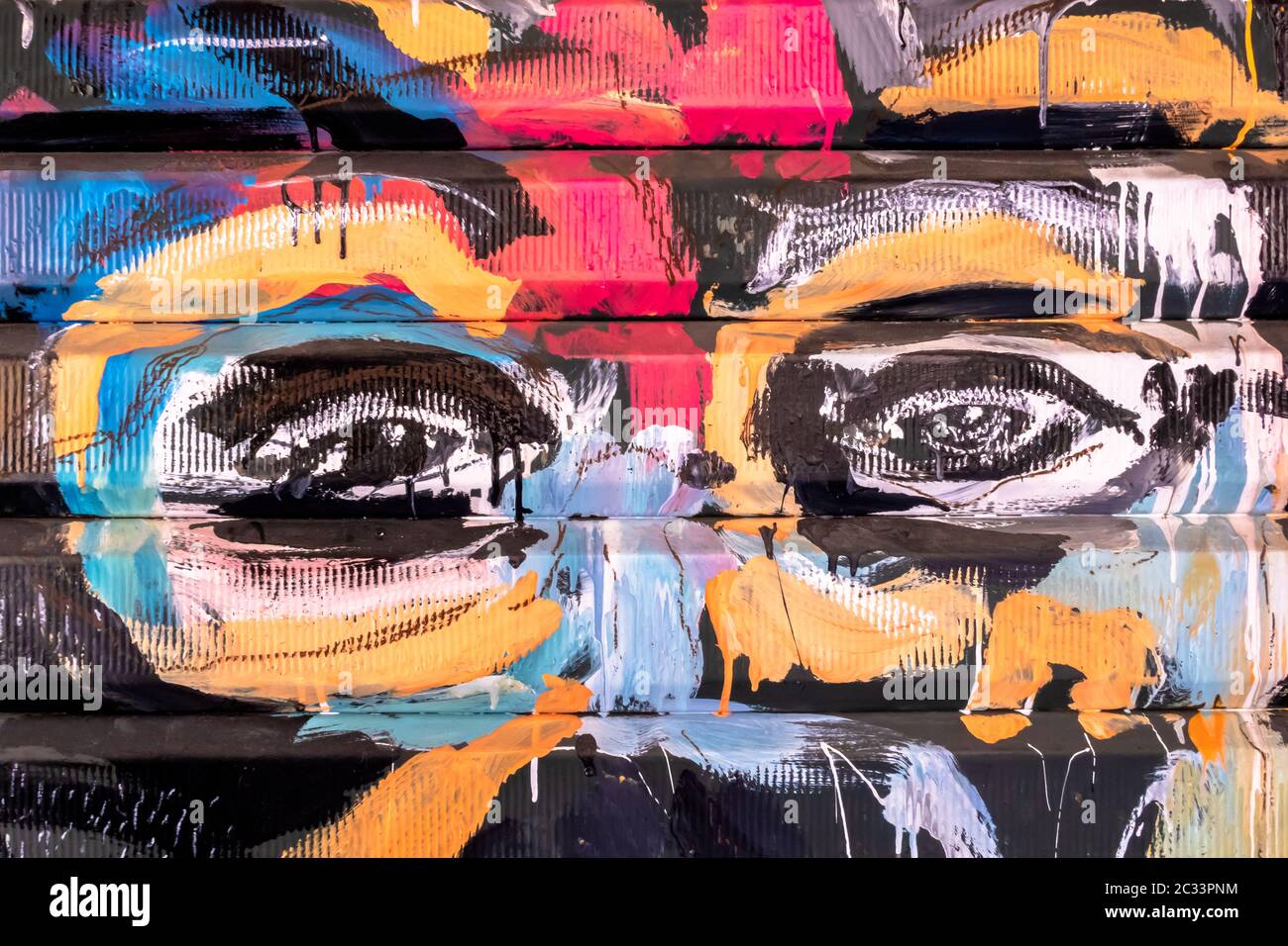 Colorful human face on graffiti artwork Stock Photo - Alamy