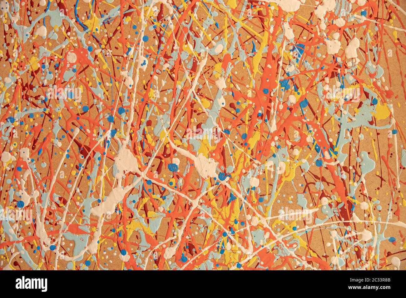 different colored spots on a yellow background created by irregular ...