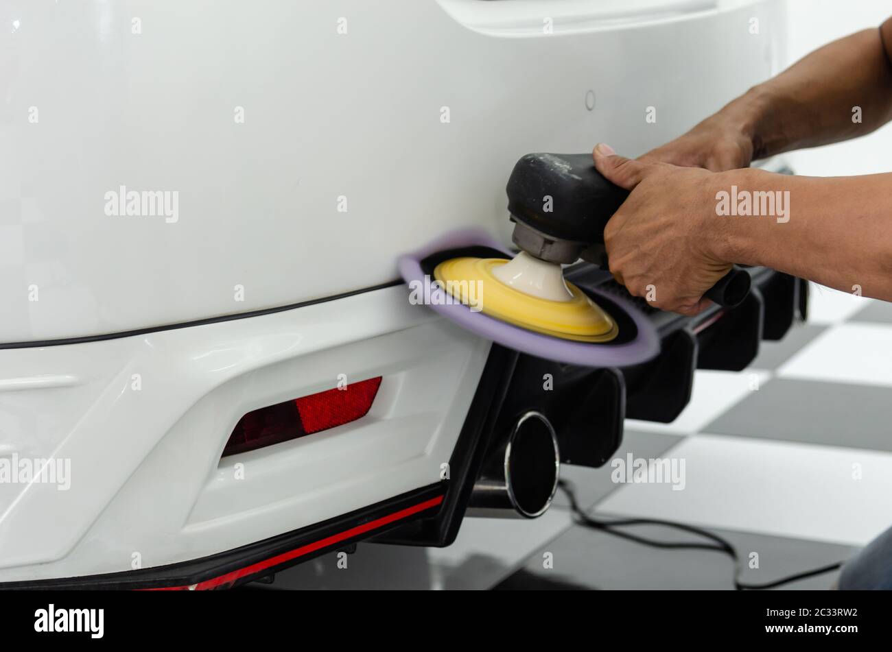 Man hands holding the work tool polish the car.Buffing and polishing ...