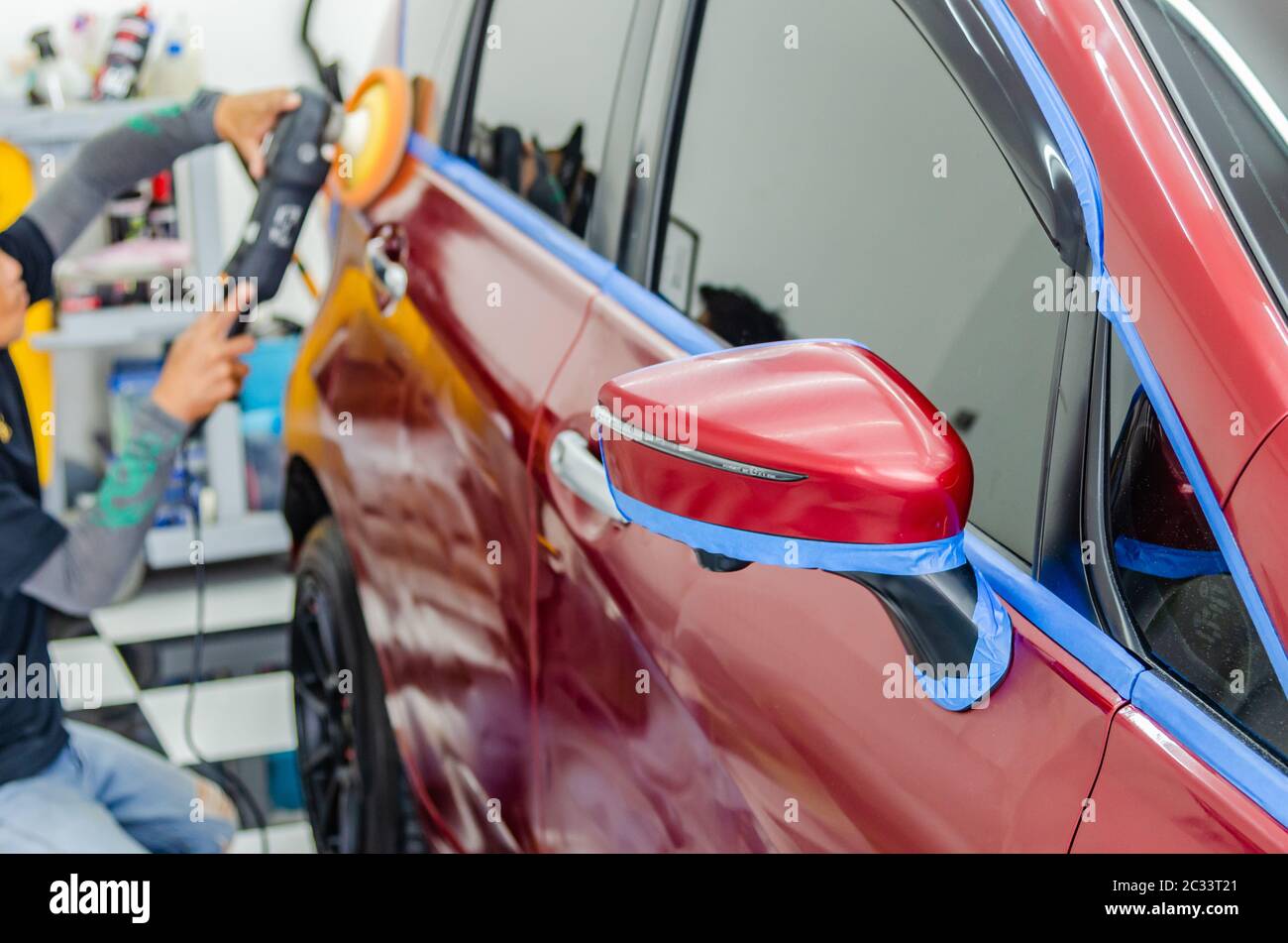 Man hands holding the work tool polish the car.Focus Side mirror. Car ...