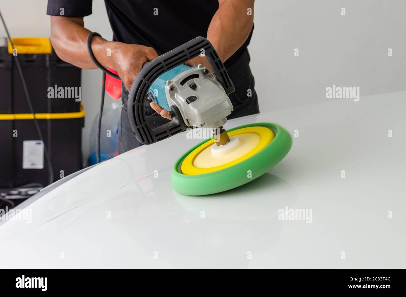 Man hands holding the work tool polish the car.Buffing and polishing ...