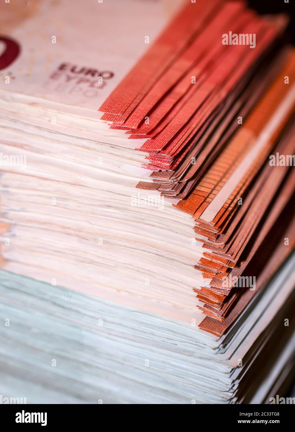 several thousand euros in banknotes, banknotes bundled on a pile Stock ...