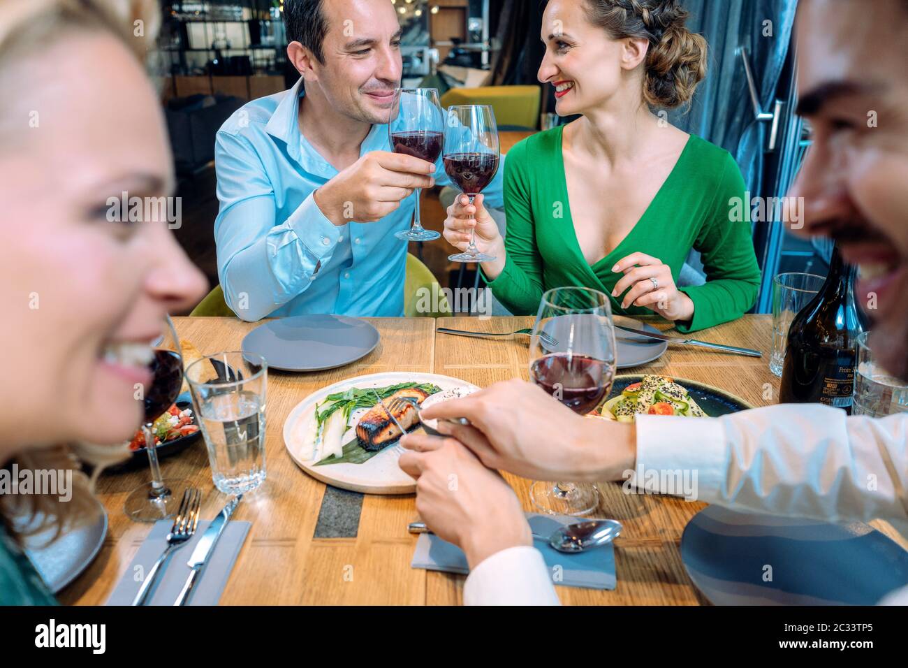 Two couples dinner hi-res stock photography and images - Alamy