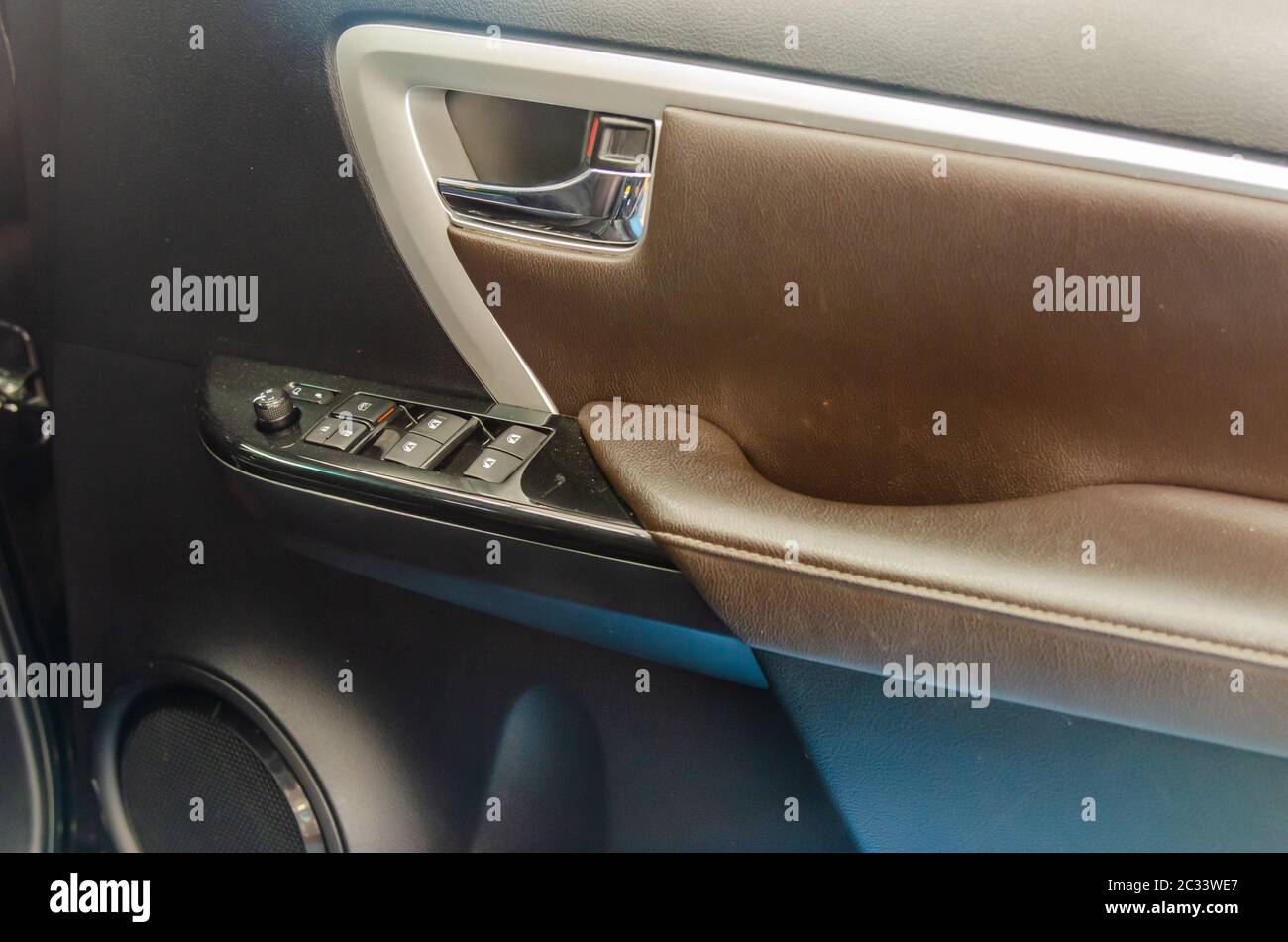 Interior car door panel. Window push button switch Stock Photo - Alamy
