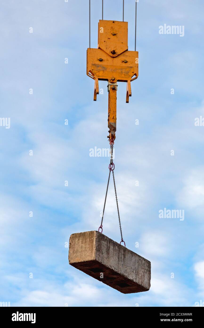 Lifting Concrete Block With Crane at Construction Site Stock Photo - Alamy